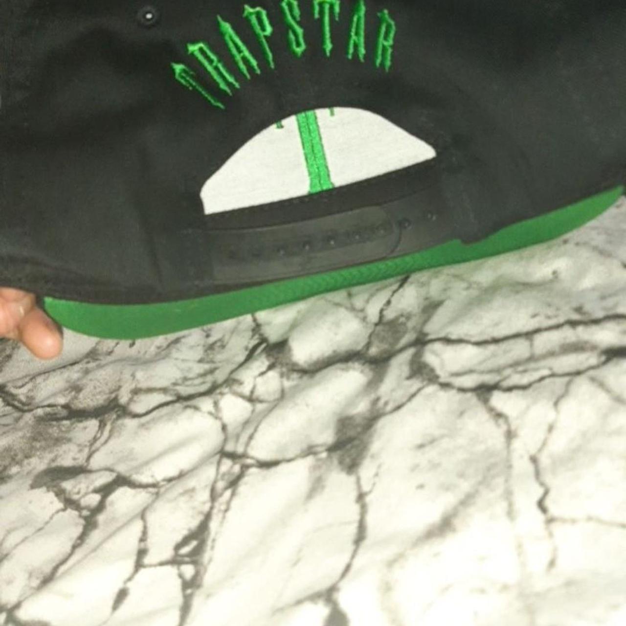 Trapstar mens snapback, with a black & green colour... - Depop