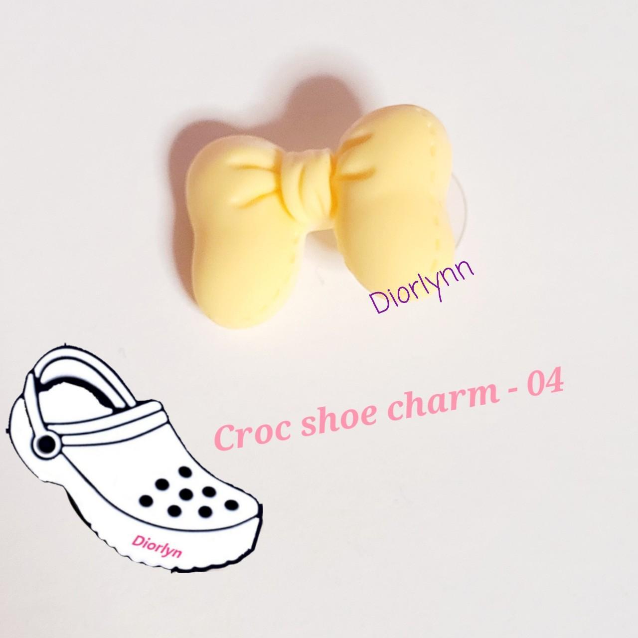 Croc shoe charm / jibbitz - yellow ribbon Brand... - Depop