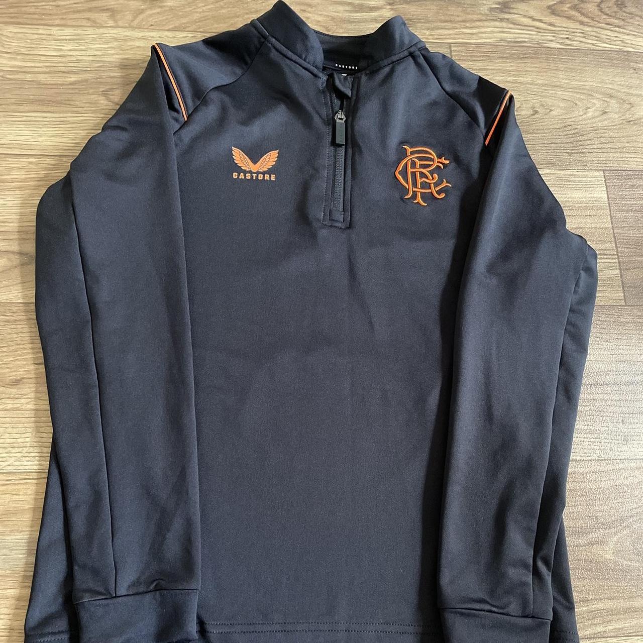 Castore Rangers FC black and orange quarter zip... - Depop