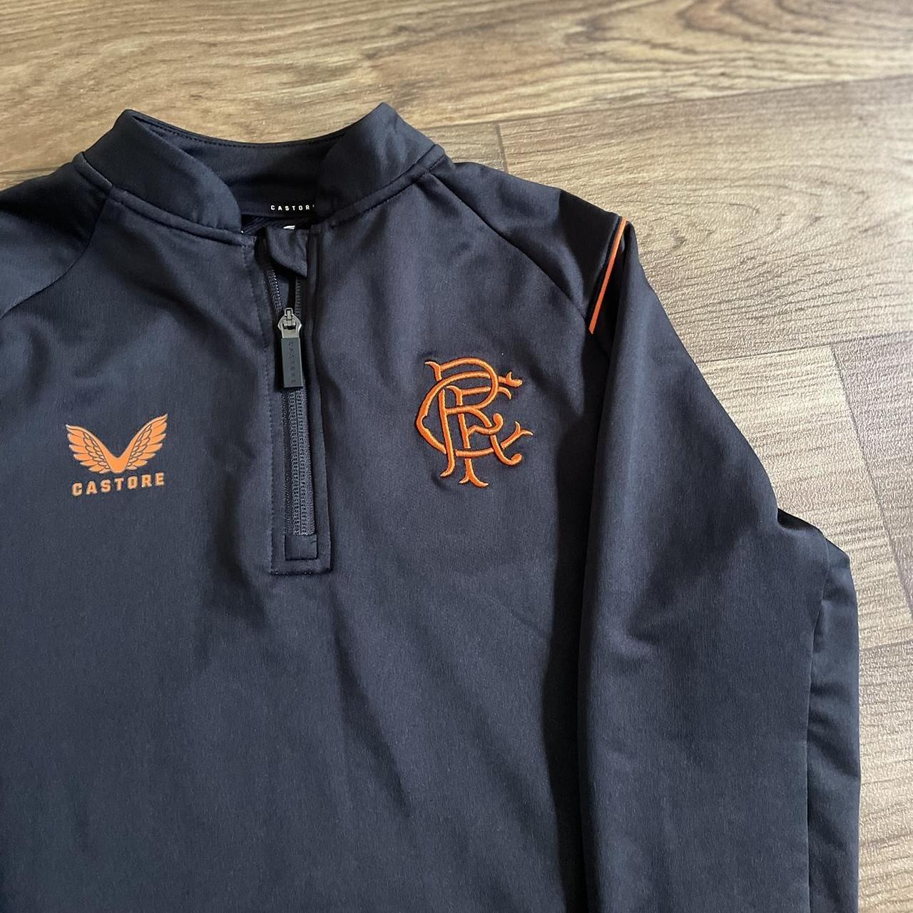 Castore Rangers FC black and orange quarter zip... - Depop