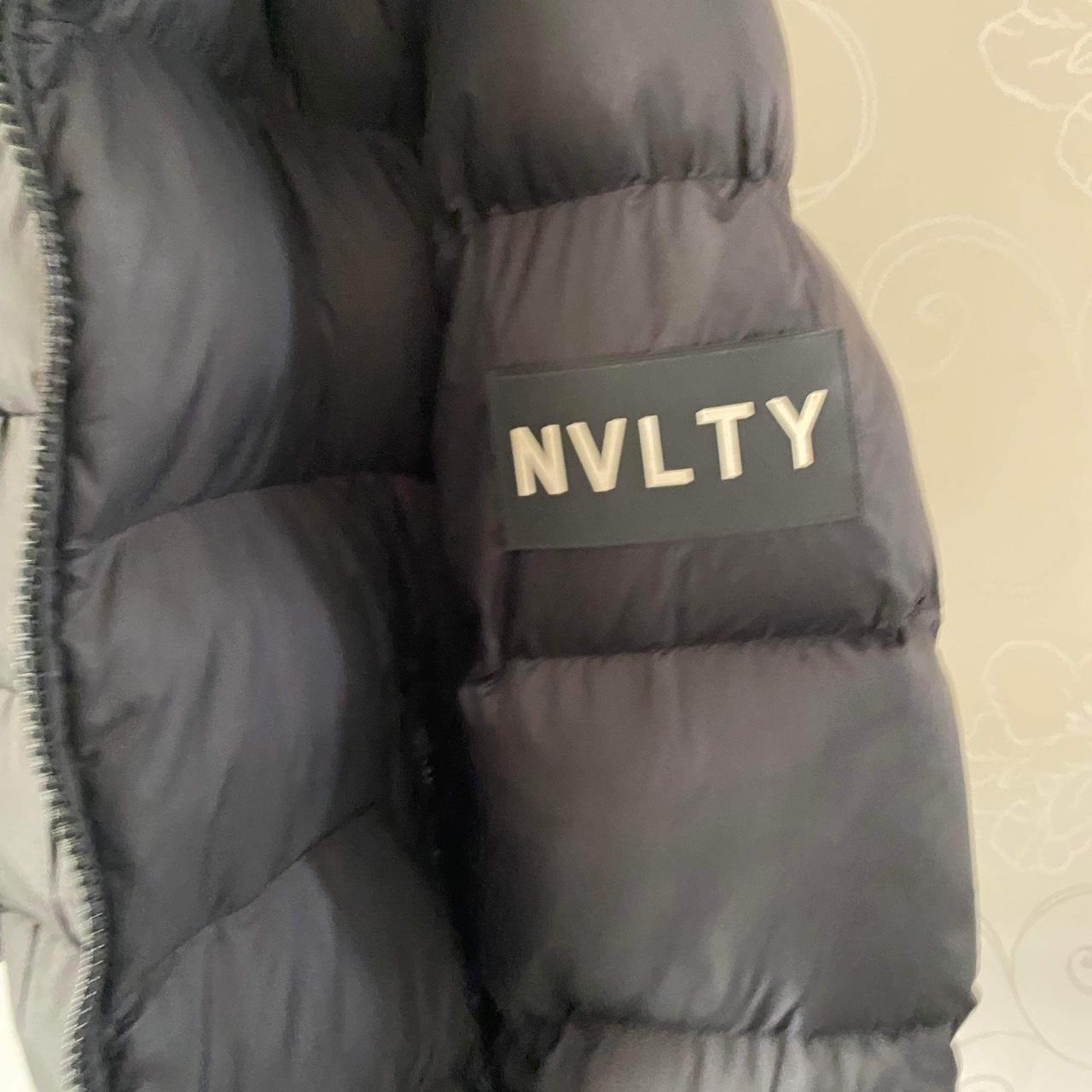 Black NVLTY puffer jacket, come with detachable... - Depop