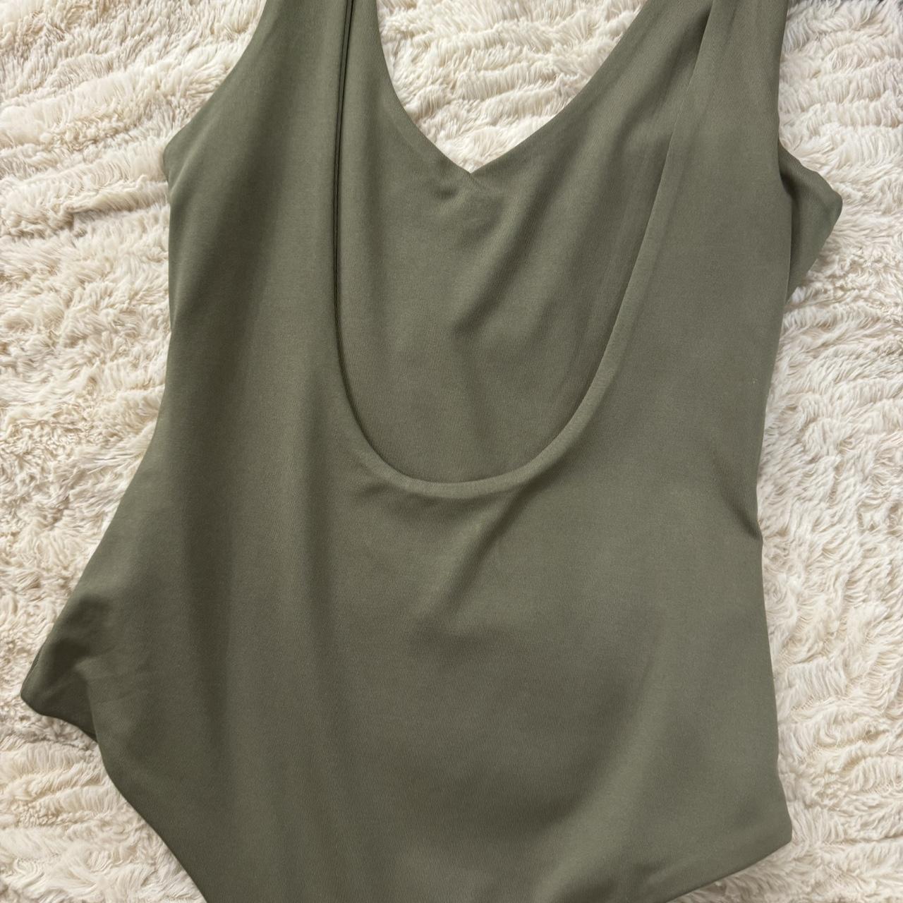 Back less khaki body suit - never worn - Depop