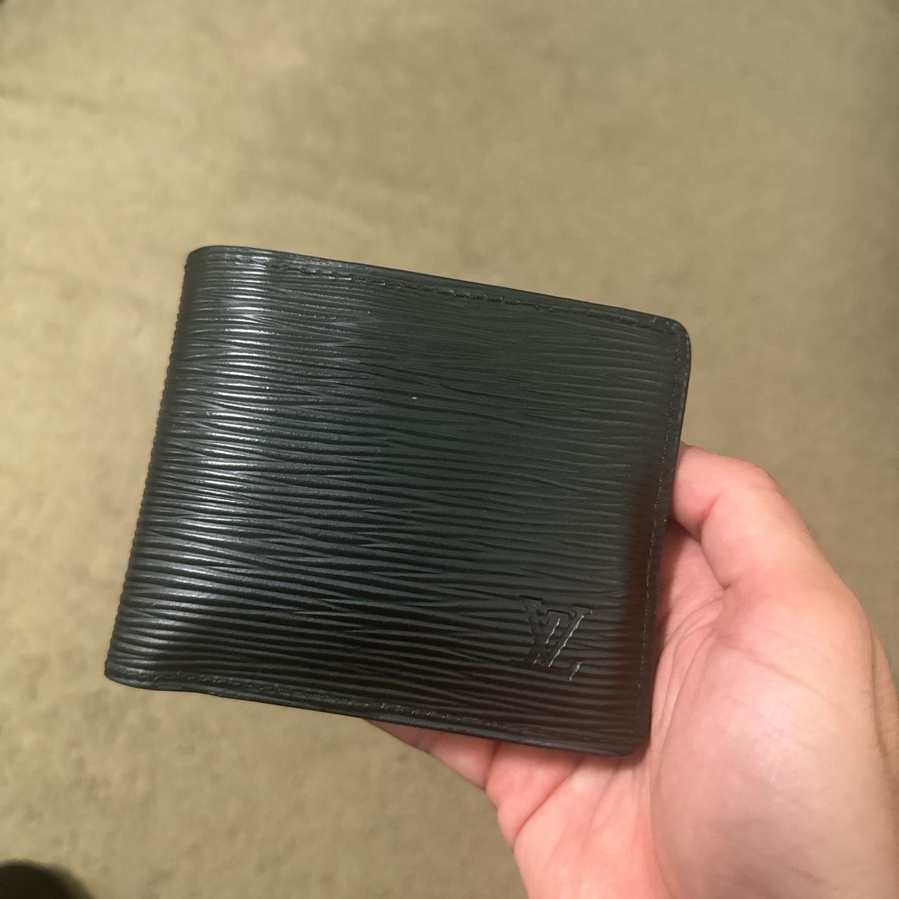 Louis Vuitton water ripple wallet with some tear and... - Depop