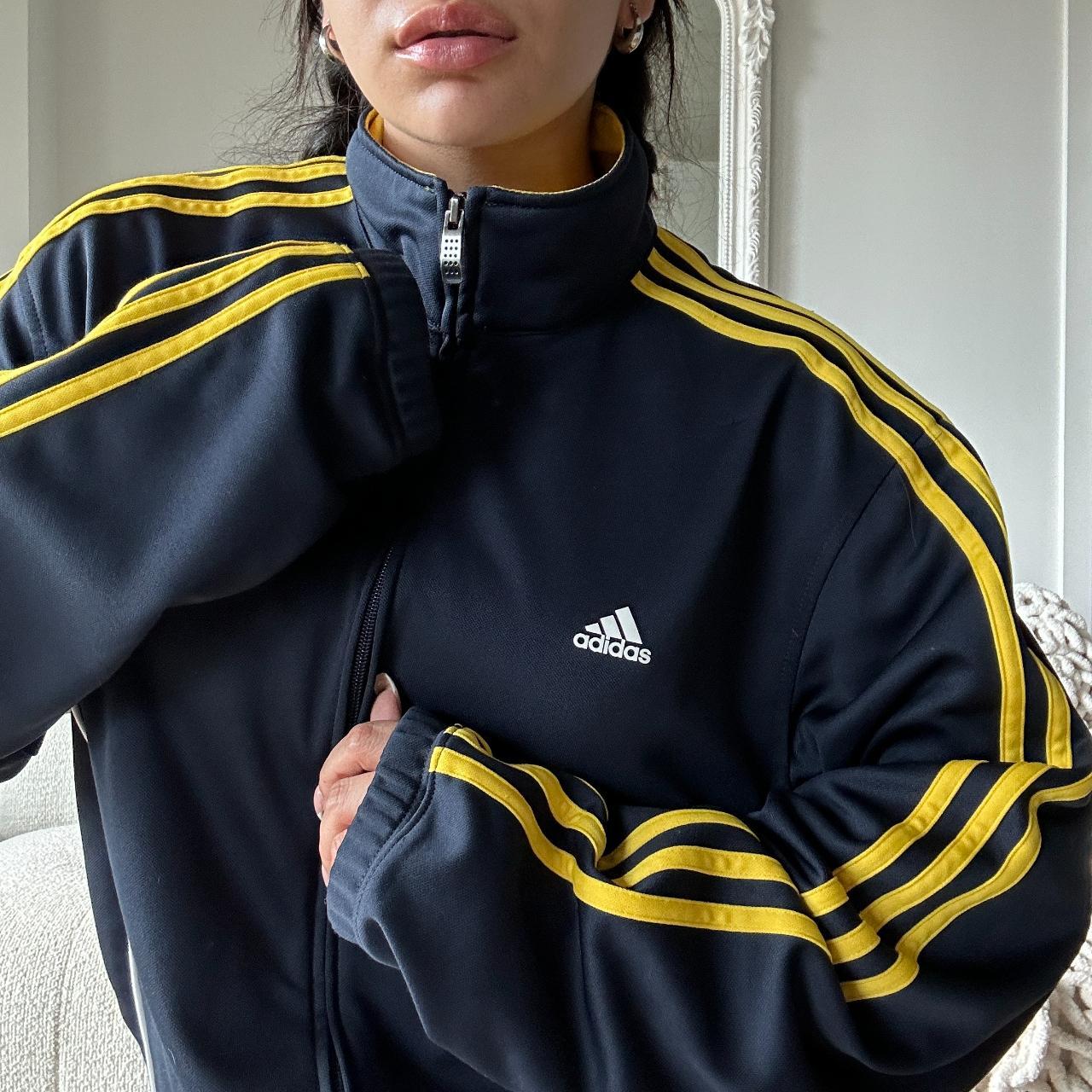 Adidas zip up track jacket in navy blue with yellow... - Depop