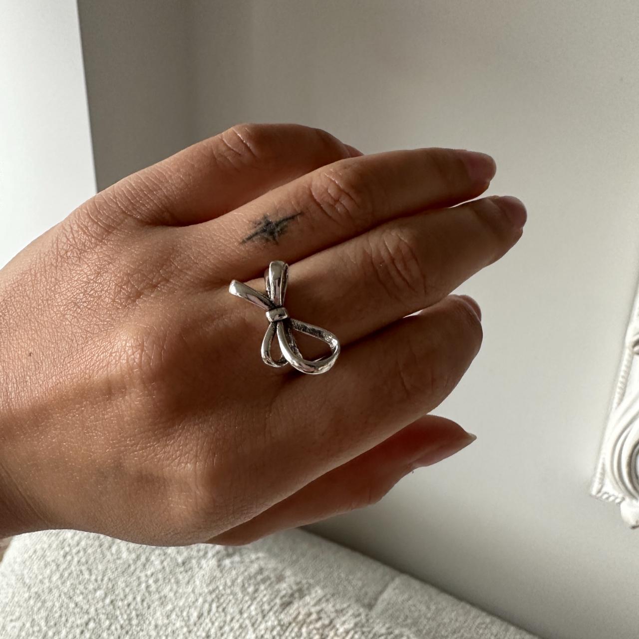 Silver ribbon ring adjustable open back. Paired with... - Depop
