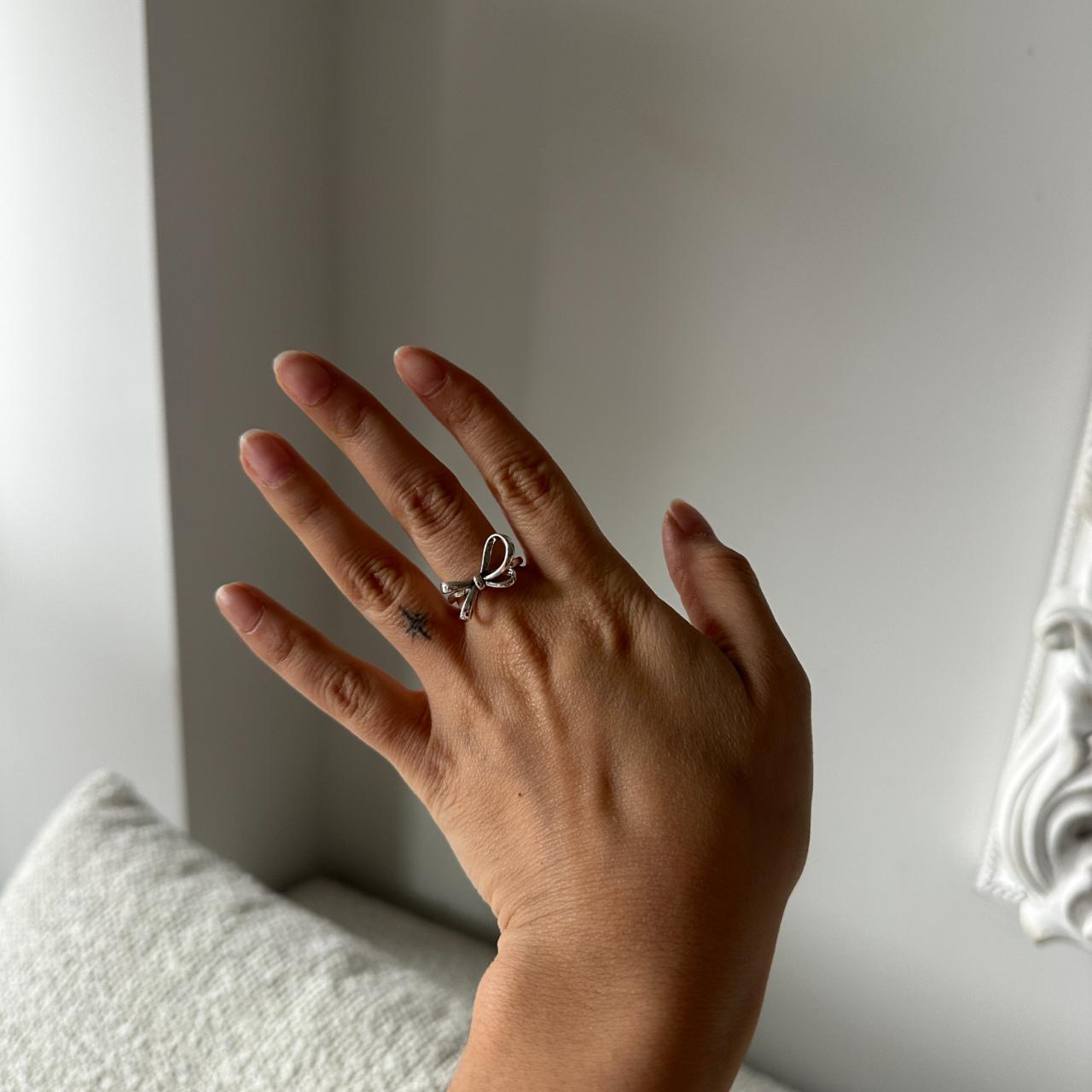 Silver ribbon ring adjustable open back. Paired with... - Depop