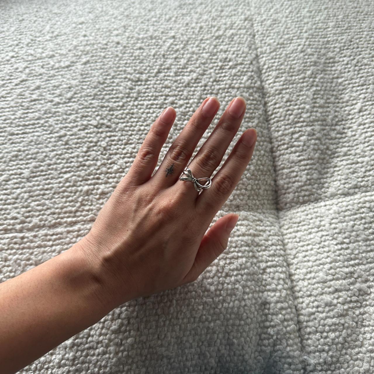 Silver ribbon ring adjustable open back. Paired with... - Depop
