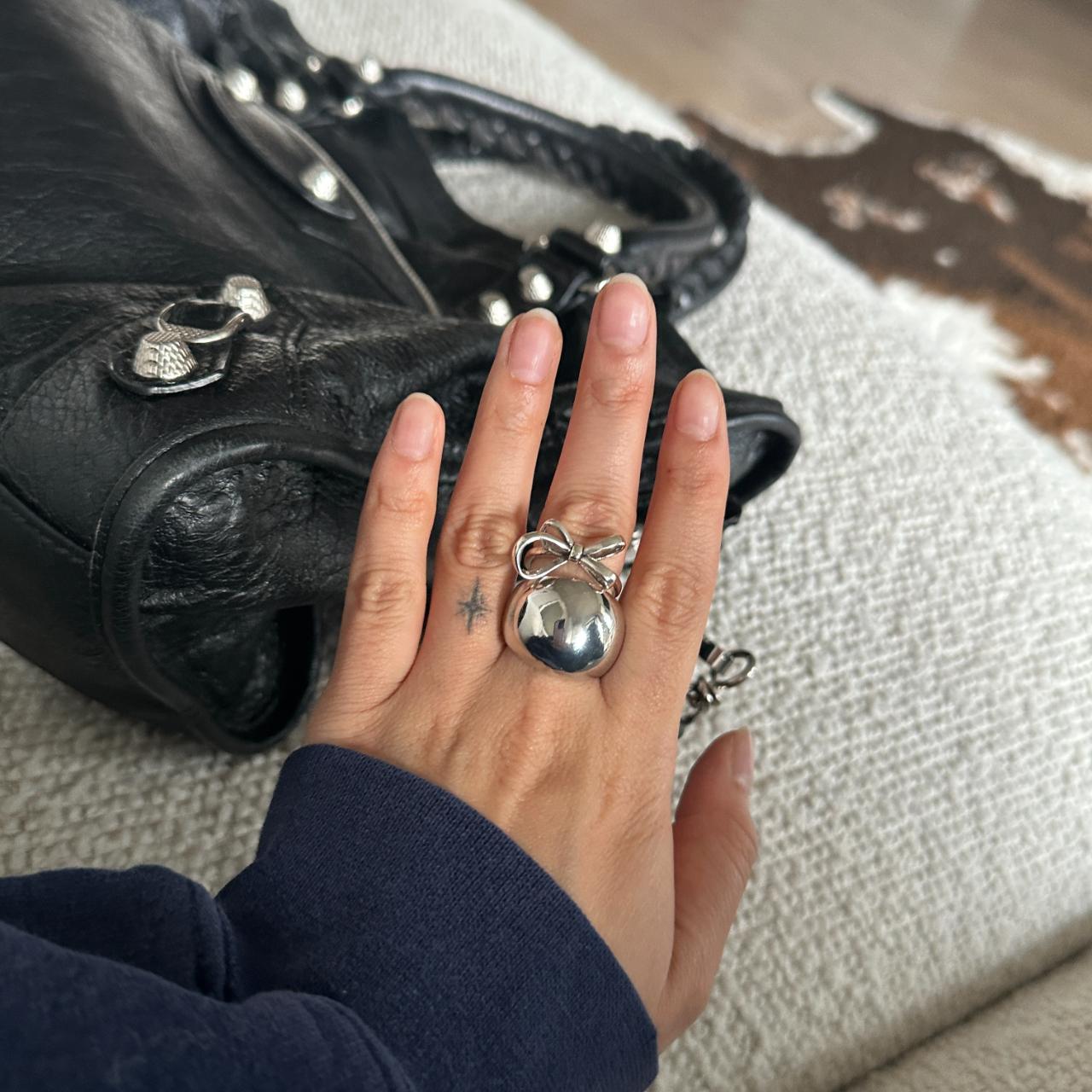 Silver ribbon ring adjustable open back. Paired with... - Depop