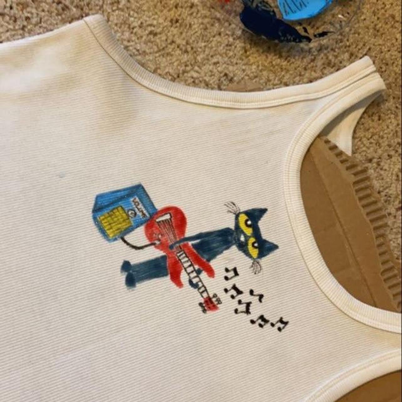 Hand-painted tank top with a cat playing a guitar... - Depop
