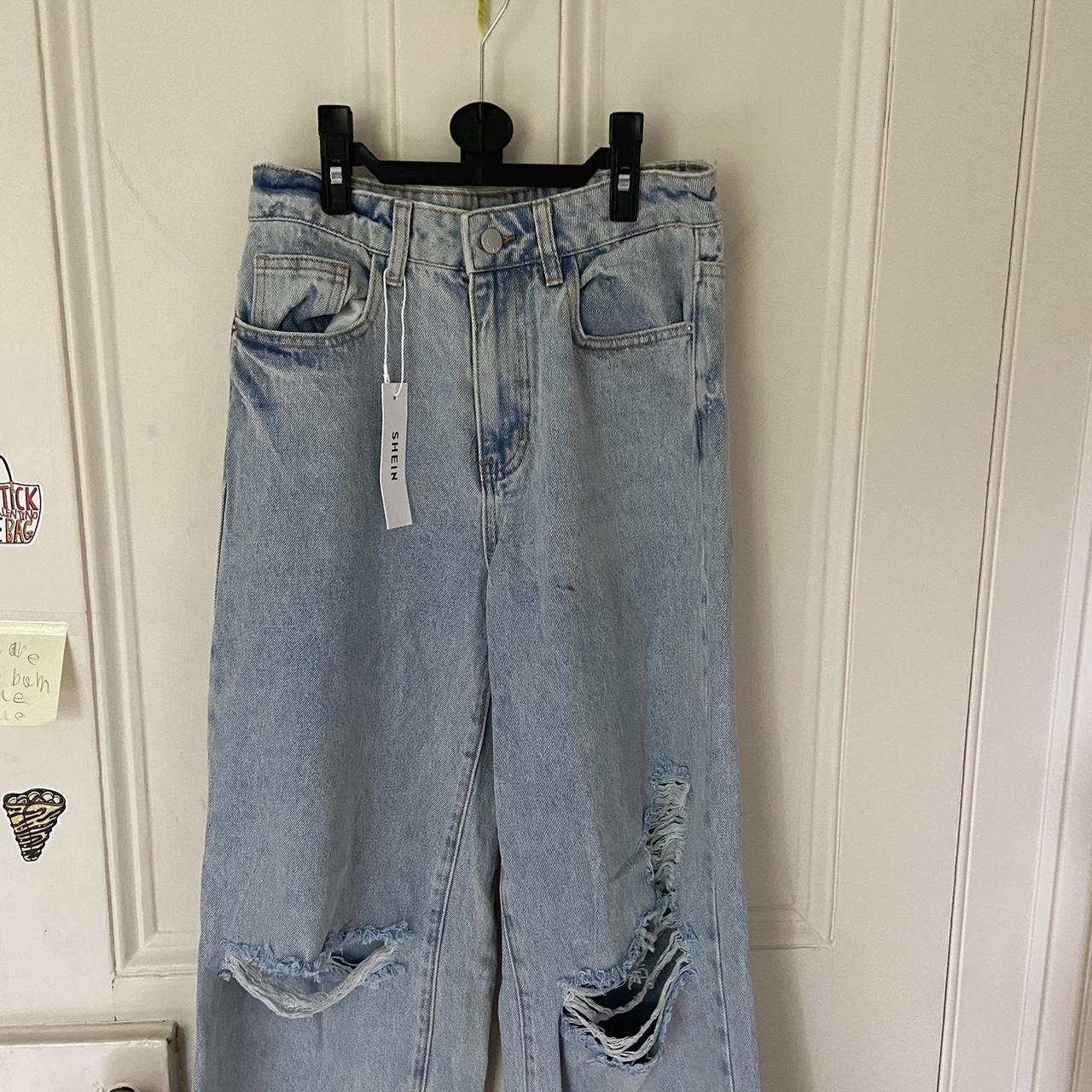 Brand new ripped jeans, wide leg and high waisted.... - Depop