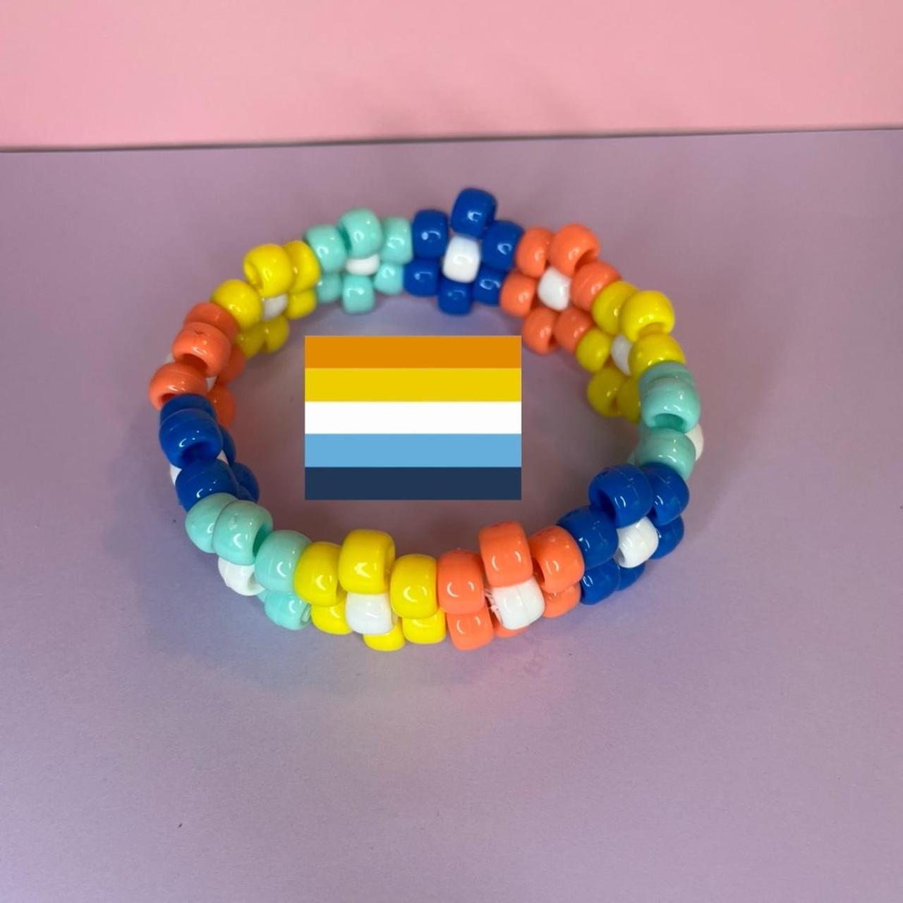AroAce pride daisy cuff! super cute way to show your... | Depop