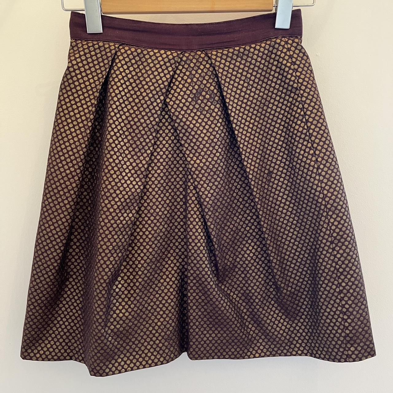 Cue maroon and gold skirt. Size 6. Some signs of... | Depop