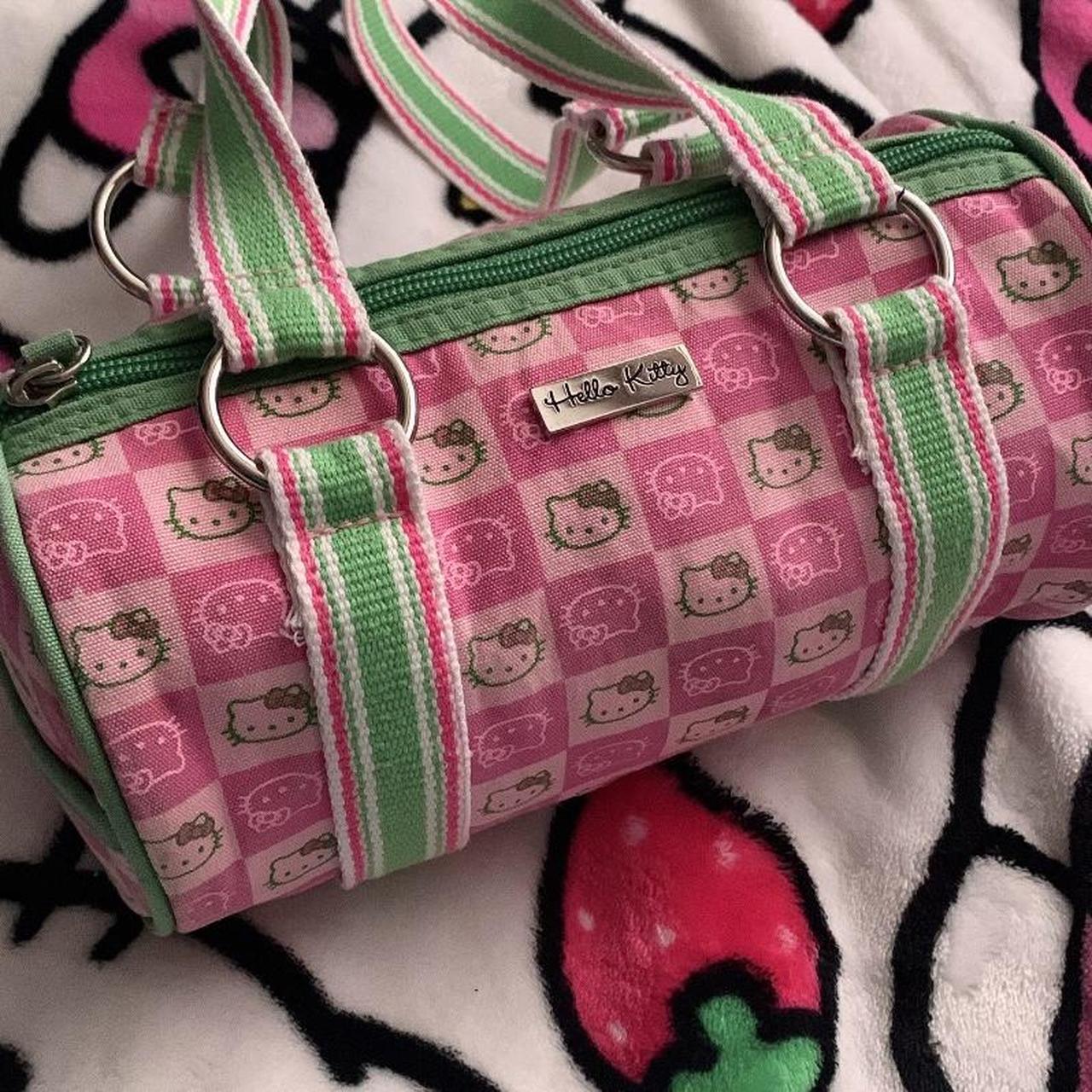 Htf Hello kitty monogram bag has yellow stain from... - Depop