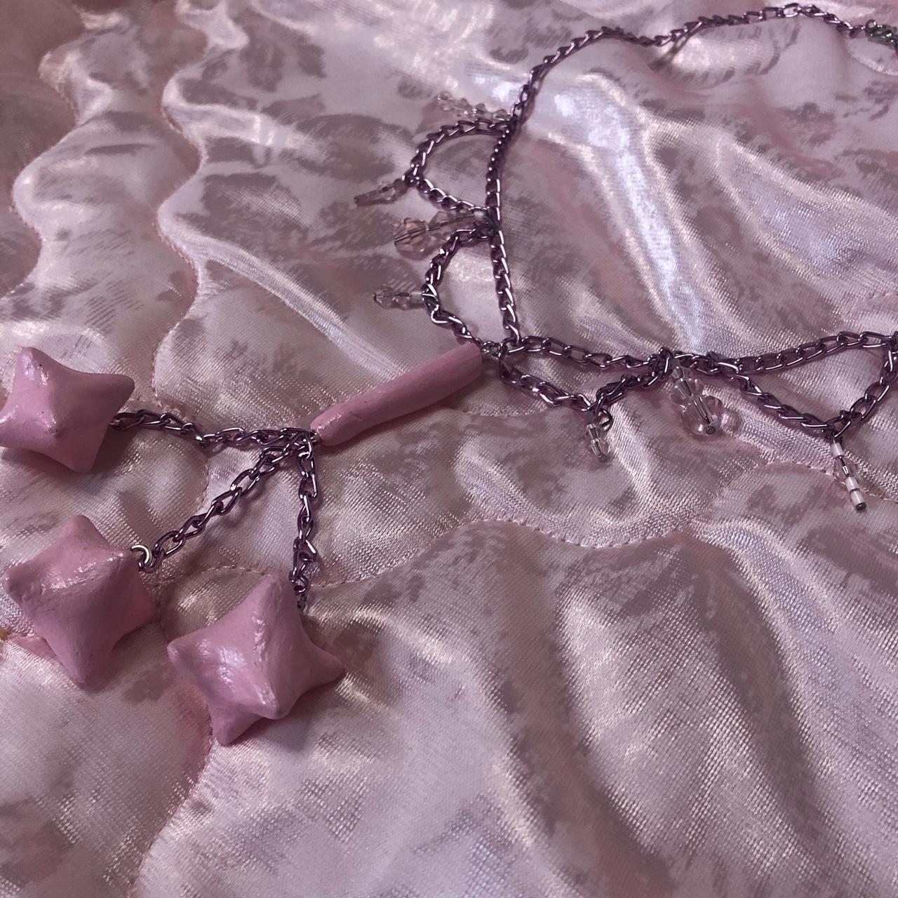 Handmade clay flail on cute pink chain. Glazed clay... - Depop