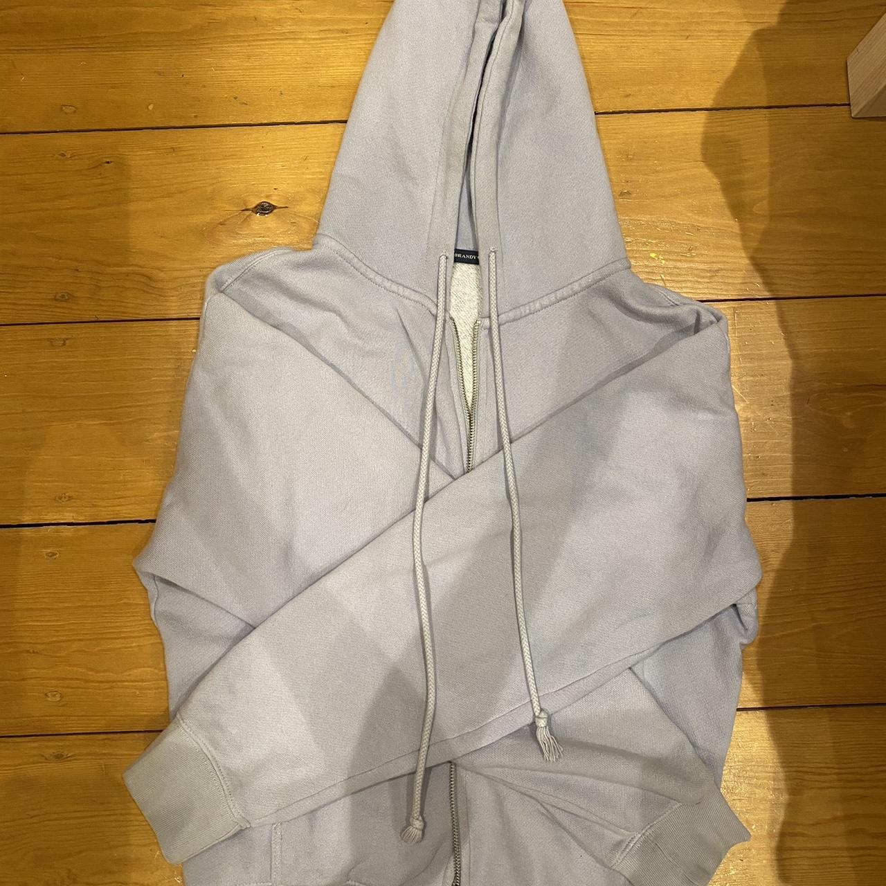 Brandy Melville light blue zip up Carla hoodie One... - Depop