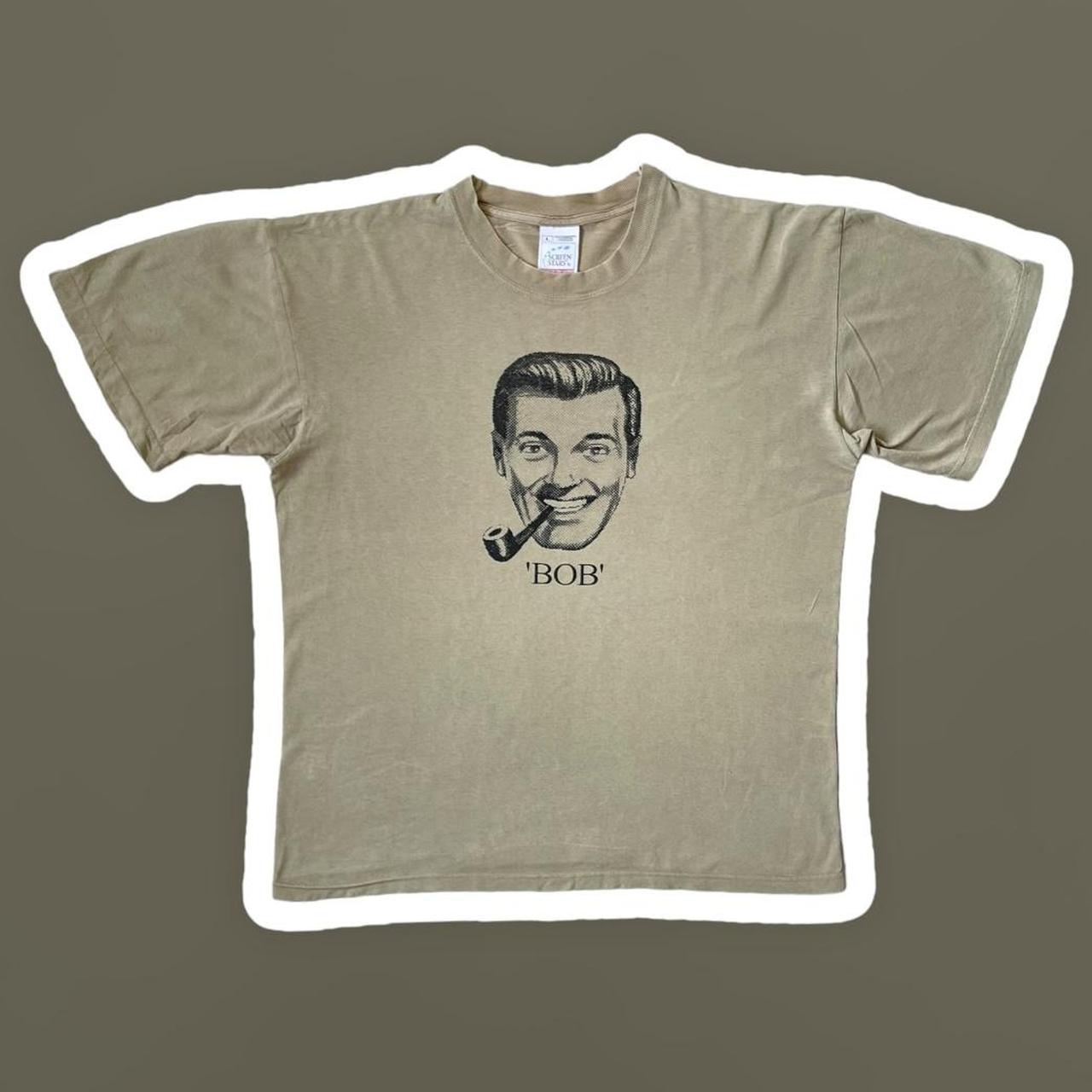 Vintage 80s Bob Dobbs’ Graphic Creme baggy cartoon... - Depop