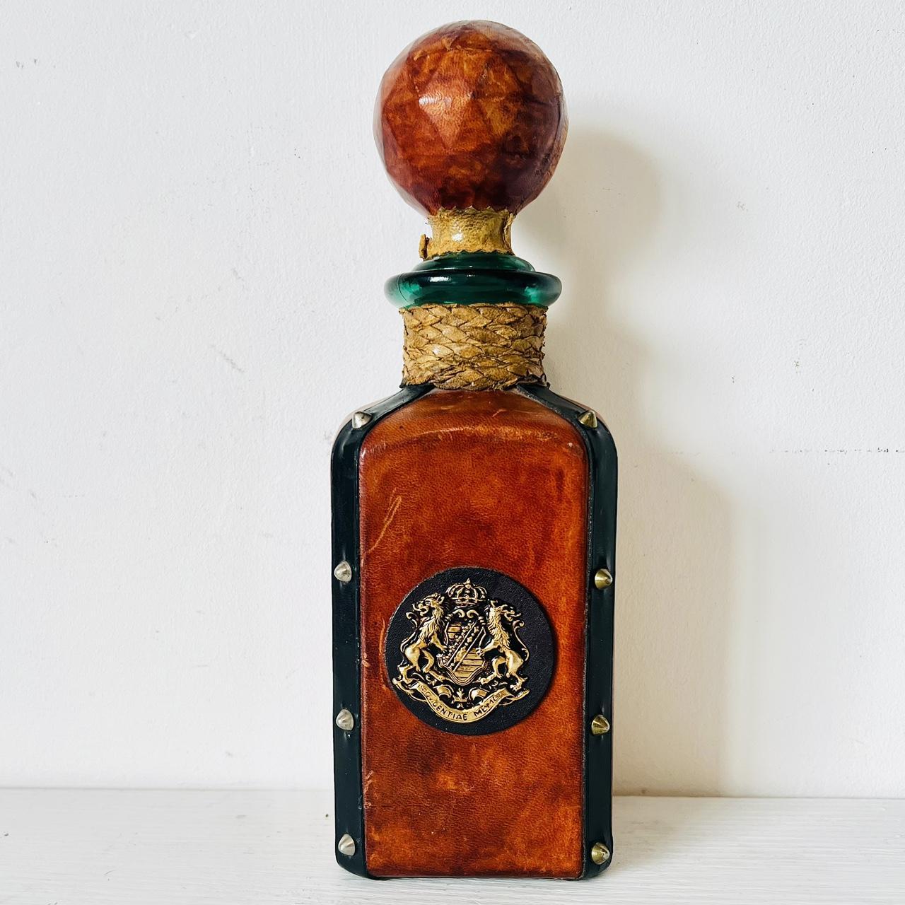 Leather wrapped glass bottle A lovely vintage... - Depop