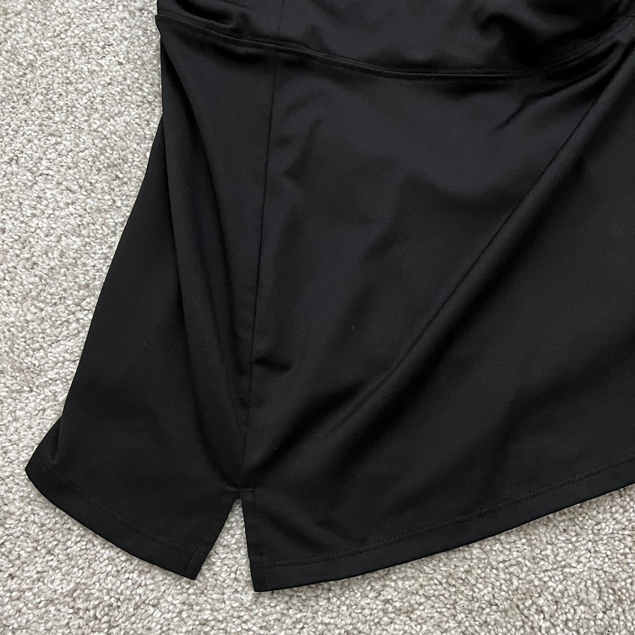 Black mini skirt with built in shorts and slits on... - Depop