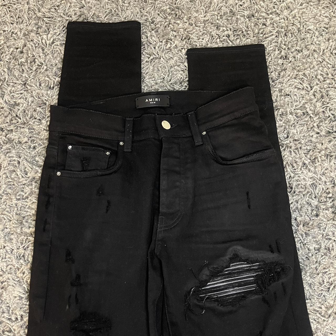 All black ripped skinny Amiri jeans. Worn once. Size 29 - Depop