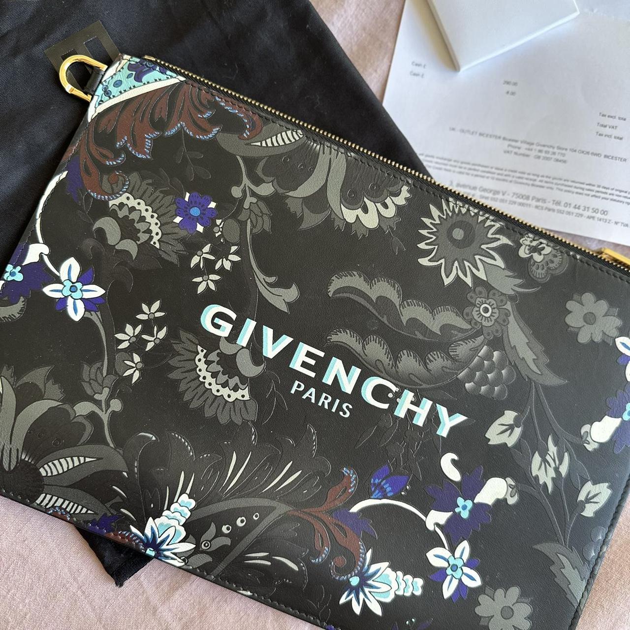 Givenchy clutch bag, barley worn - Depop