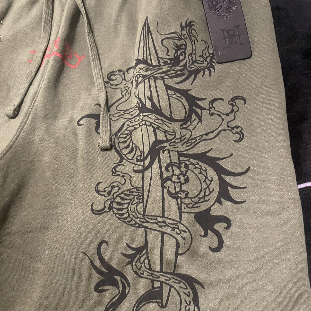 Green Ed hardy guys shorts with crazy detail on the... - Depop