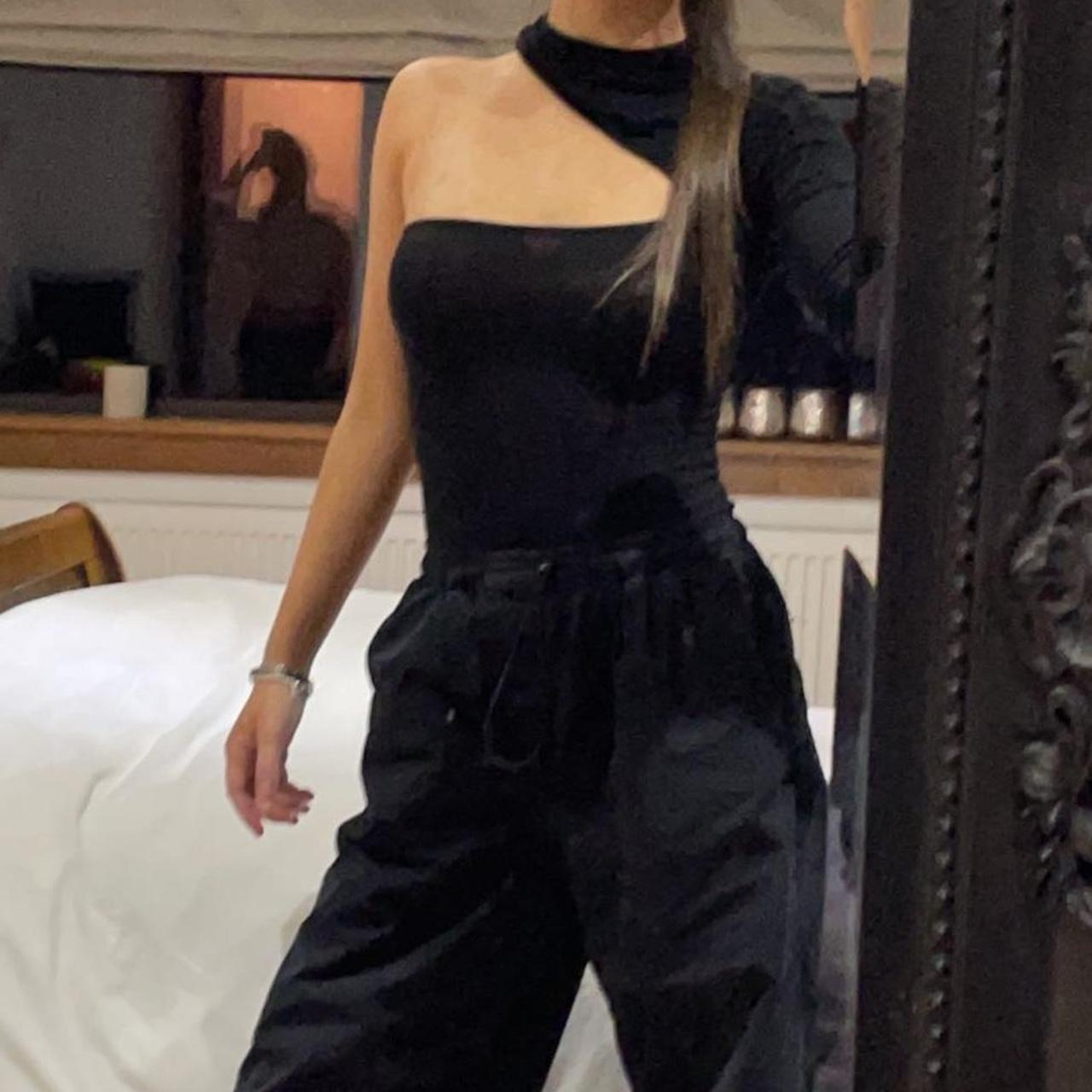 Black one sleeved bodysuit worn once, would fit 6/8... - Depop