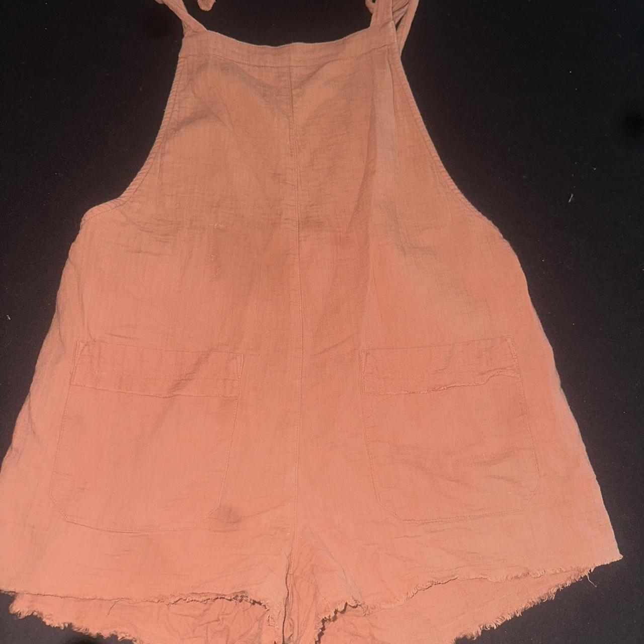 orange billabong romper great for game days or as a... - Depop