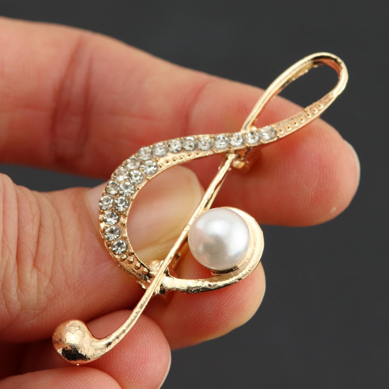 Gold plated treble clef brooch, beautiful treble... | Depop