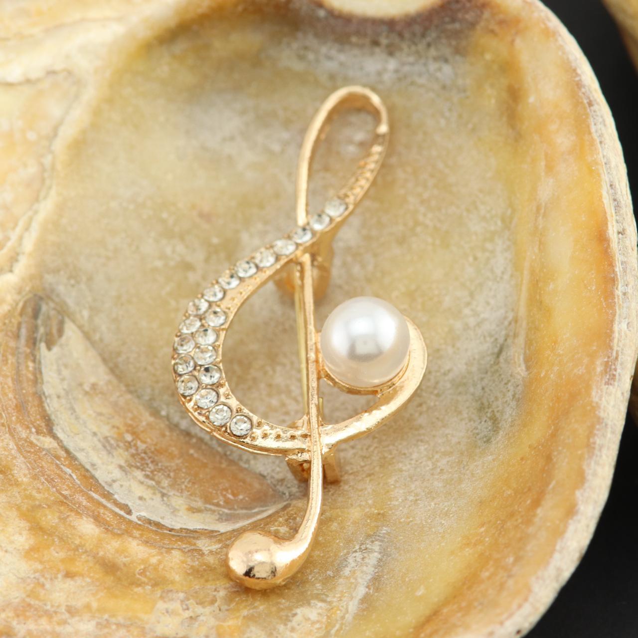 Gold plated treble clef brooch, beautiful treble... | Depop