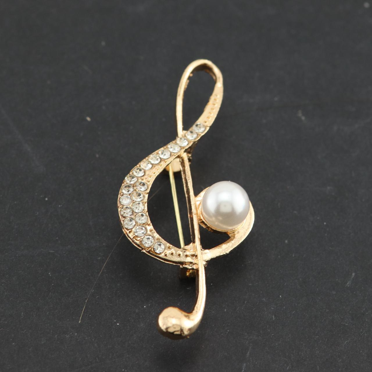 Gold plated treble clef brooch, beautiful treble... | Depop