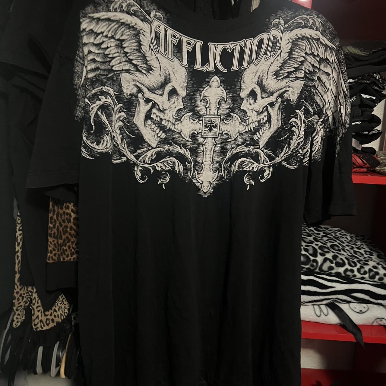 Winged skull affliction graphic tee has some small... - Depop