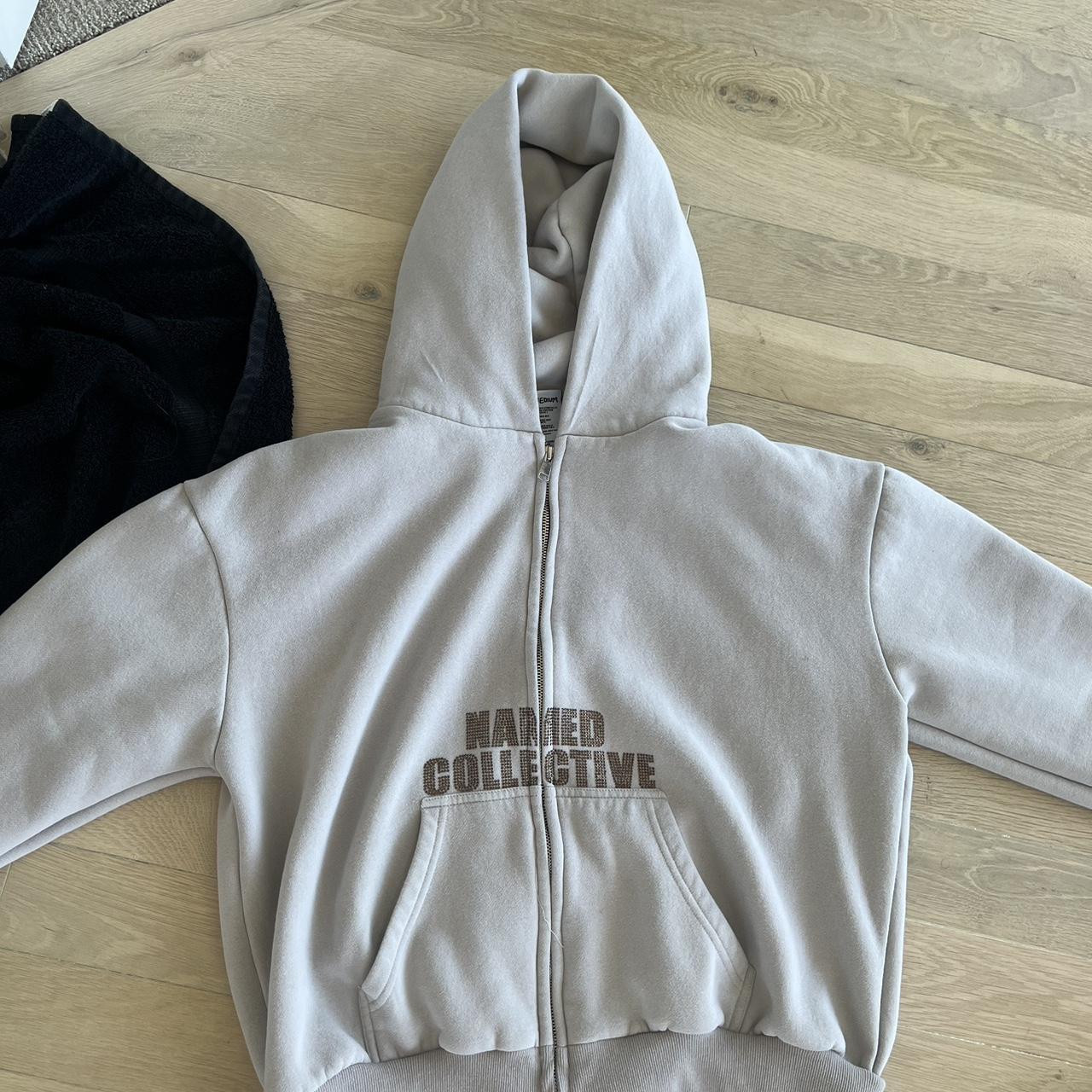 Named collective hoodie. Never worn, size medium - Depop