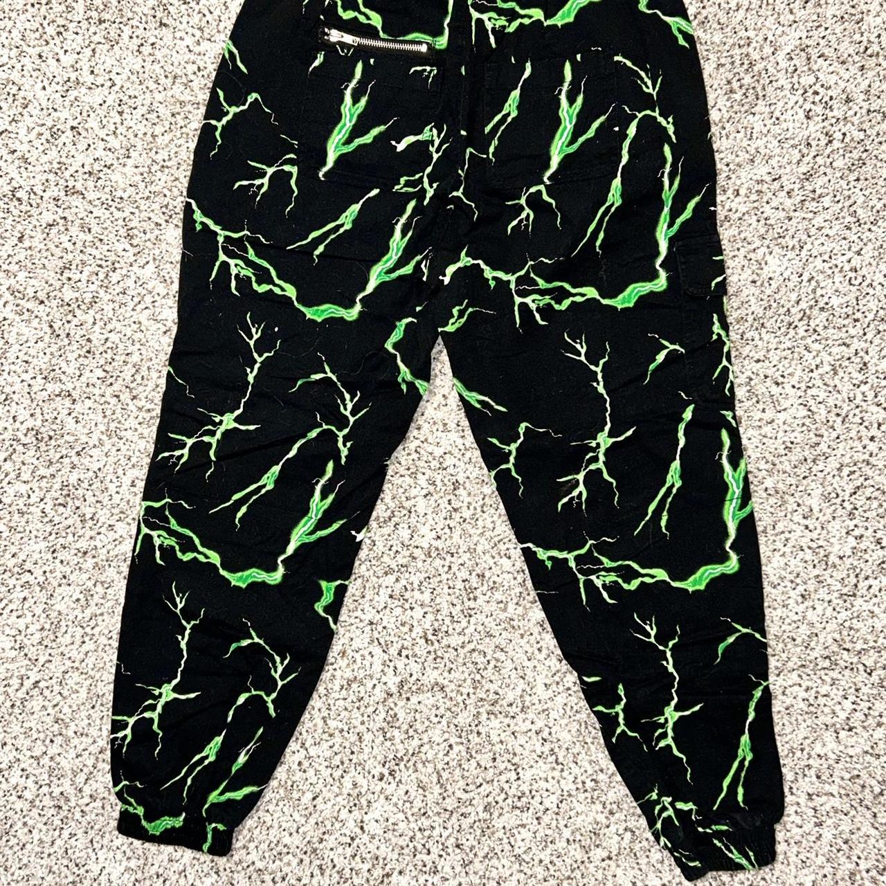 Hot Topic Green Lightning Pants In excellent... - Depop