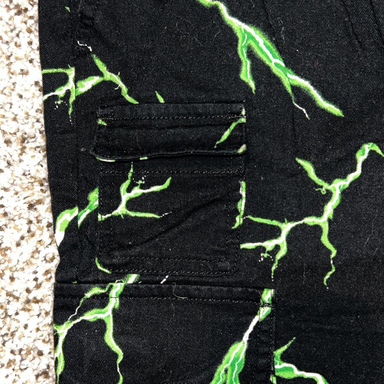 Hot Topic Green Lightning Pants In excellent... - Depop