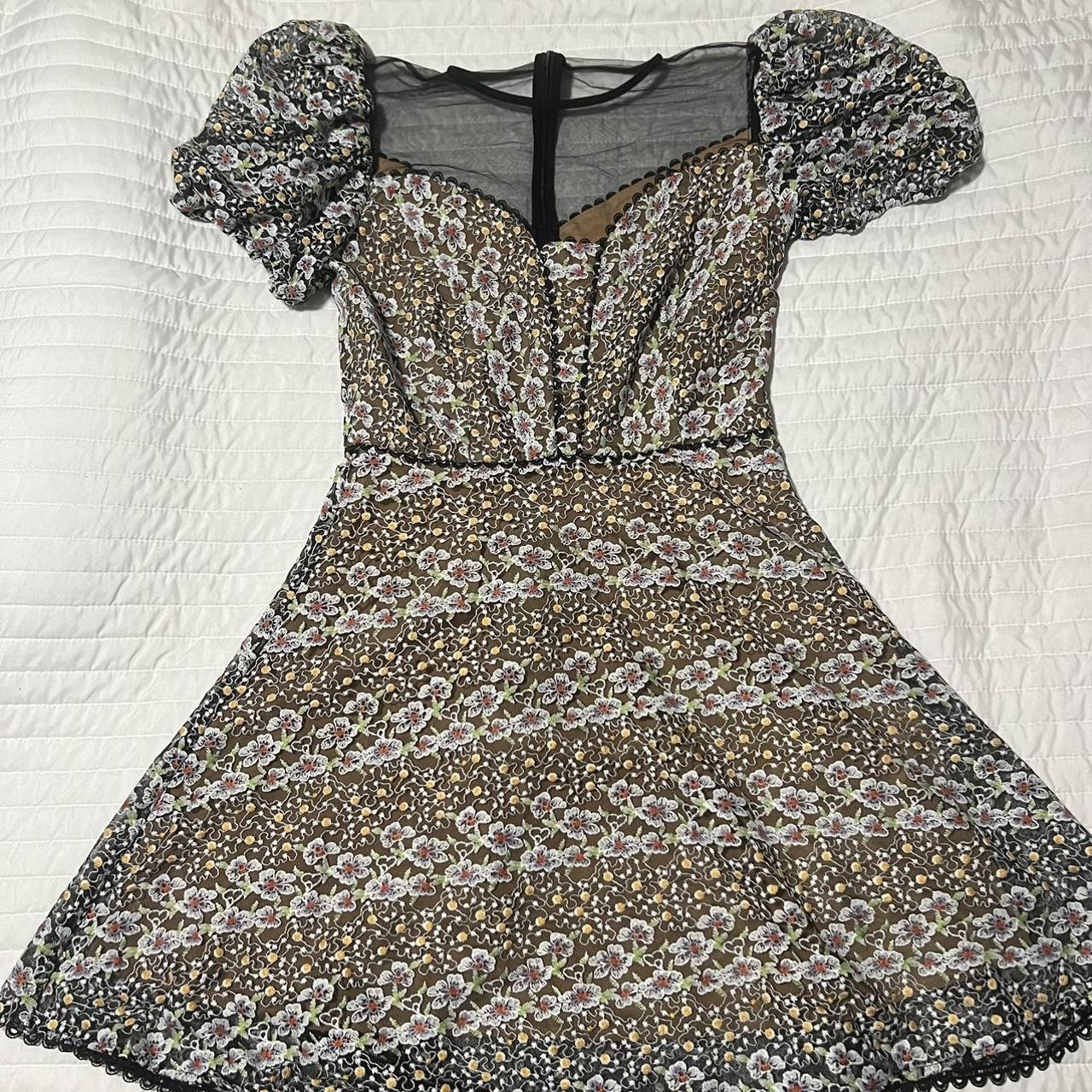 Elliatt black floral mini dress with puff sleeves... - Depop