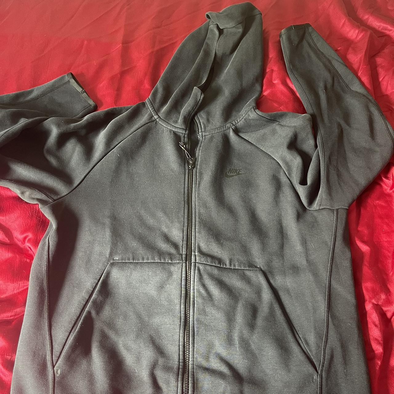 Nike tech black hoodie worn couple of times zip tips... - Depop