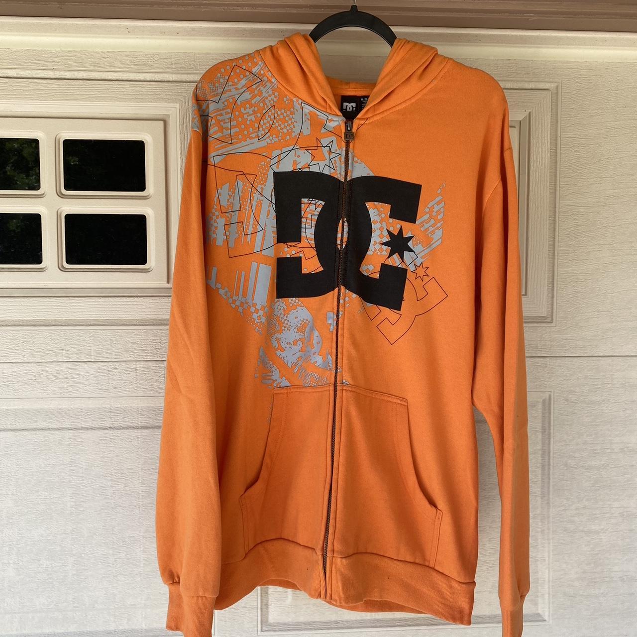 2000s DC Skateboards zip-up hoodie in a orange color... - Depop