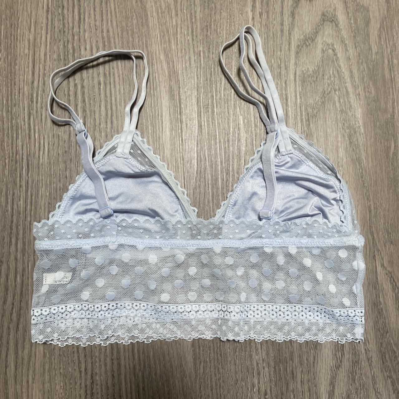 Pretty light blue bralette with lace trim, size S.... - Depop