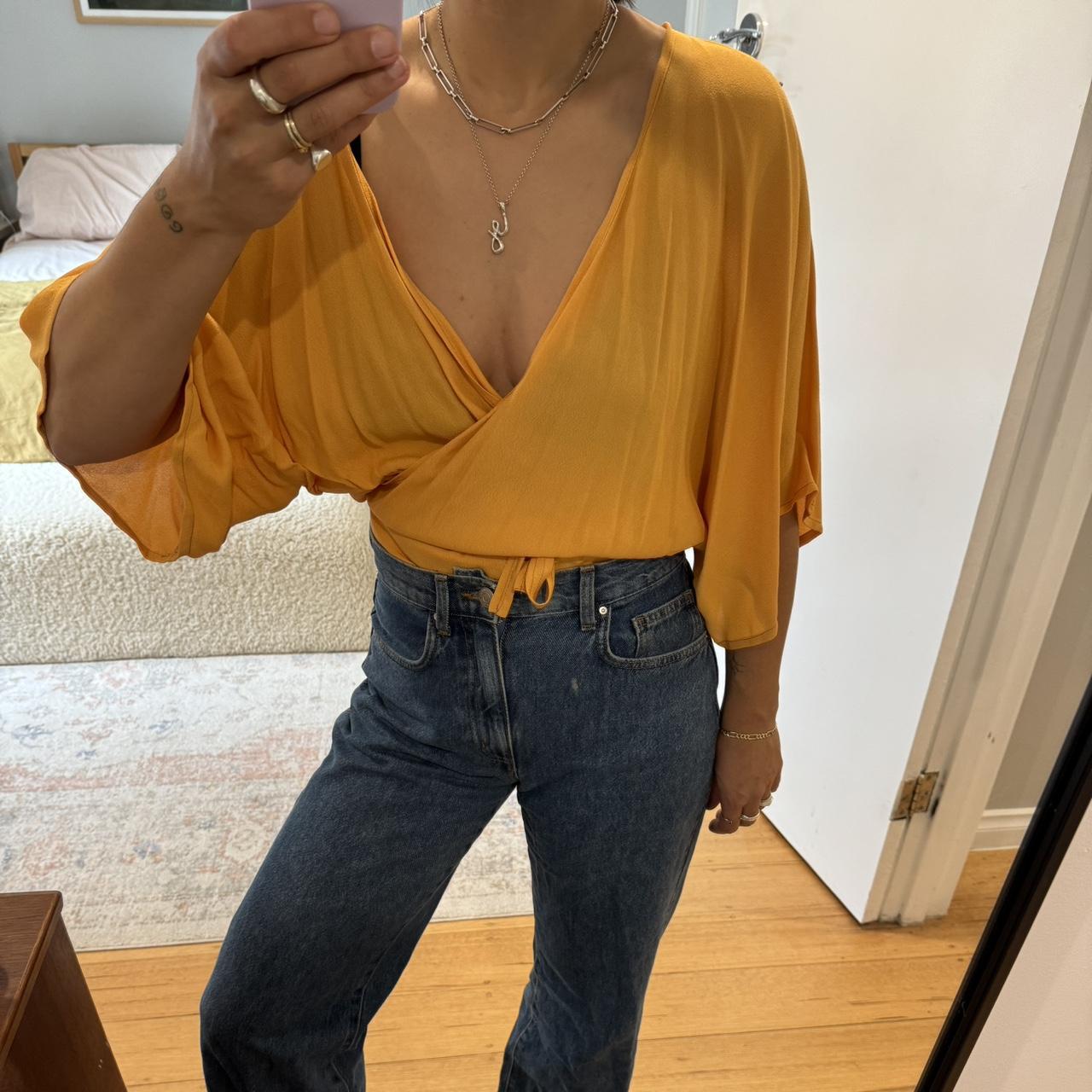 Honest studios orange wrap top Purchased from... - Depop