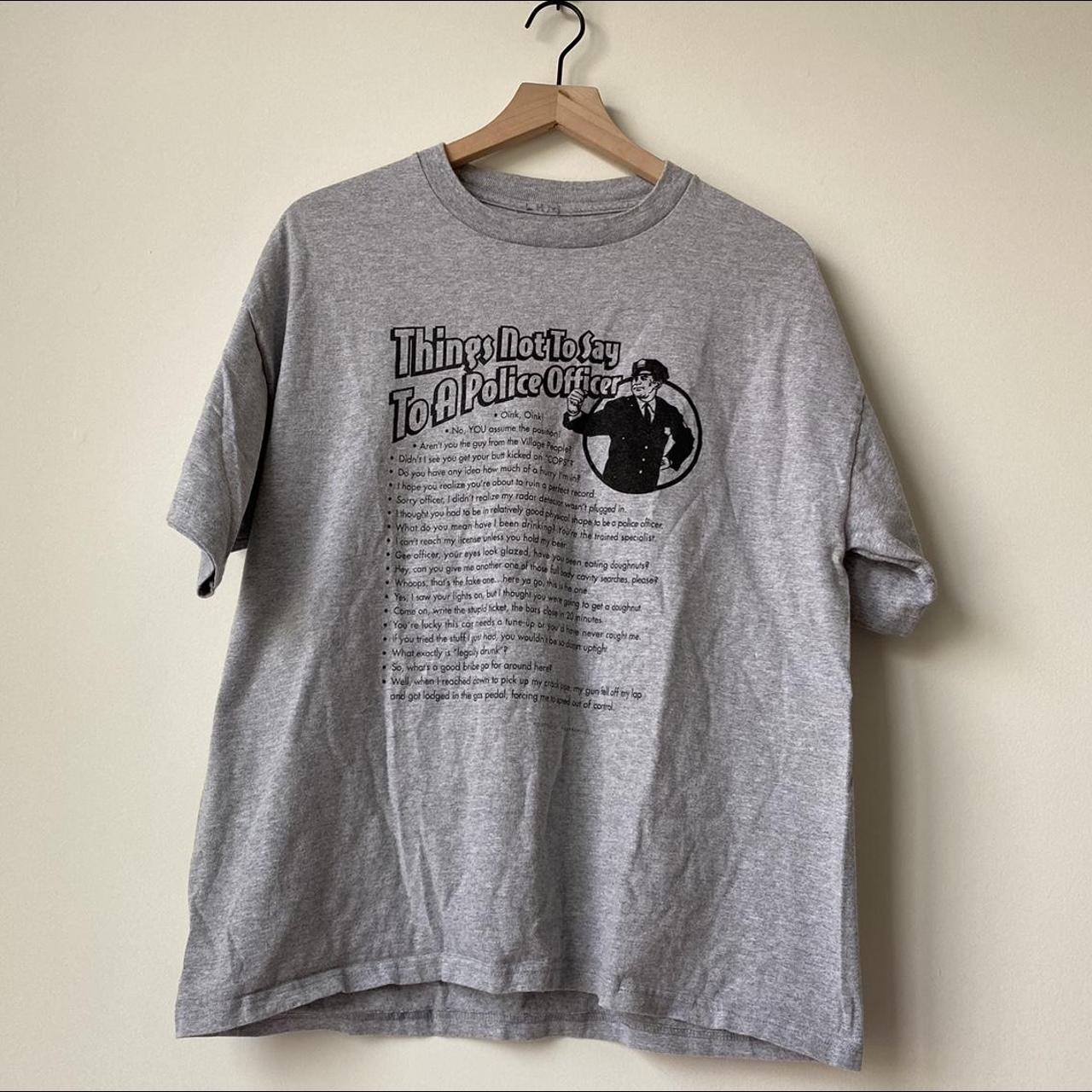 2002 Spencer’s Graphic Tshirt 👮‍♂️ Size... - Depop