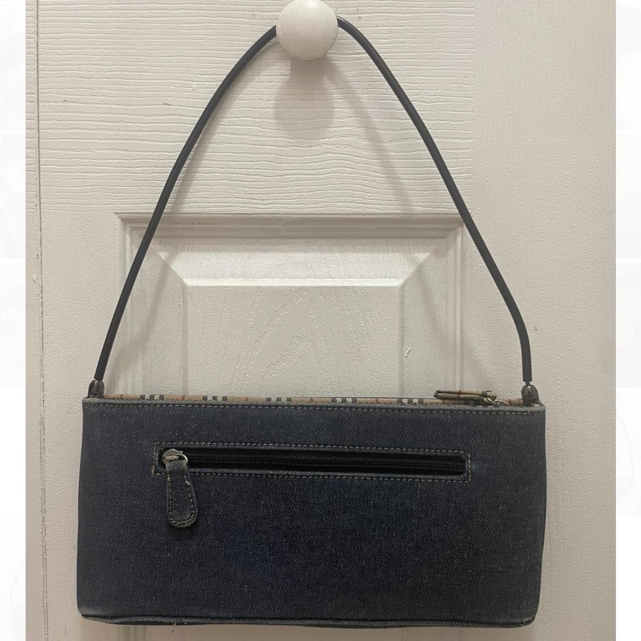 This is a cute denim mini purse. That has a wire as... - Depop