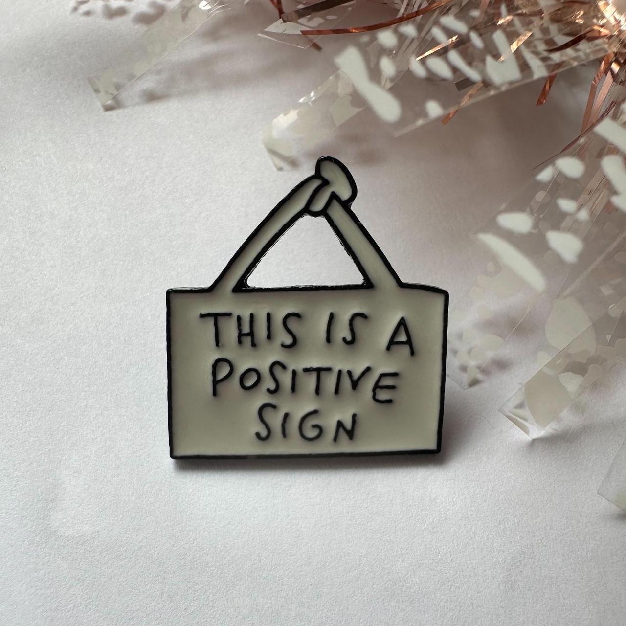 “This is a positive sign” pin. message for... - Depop