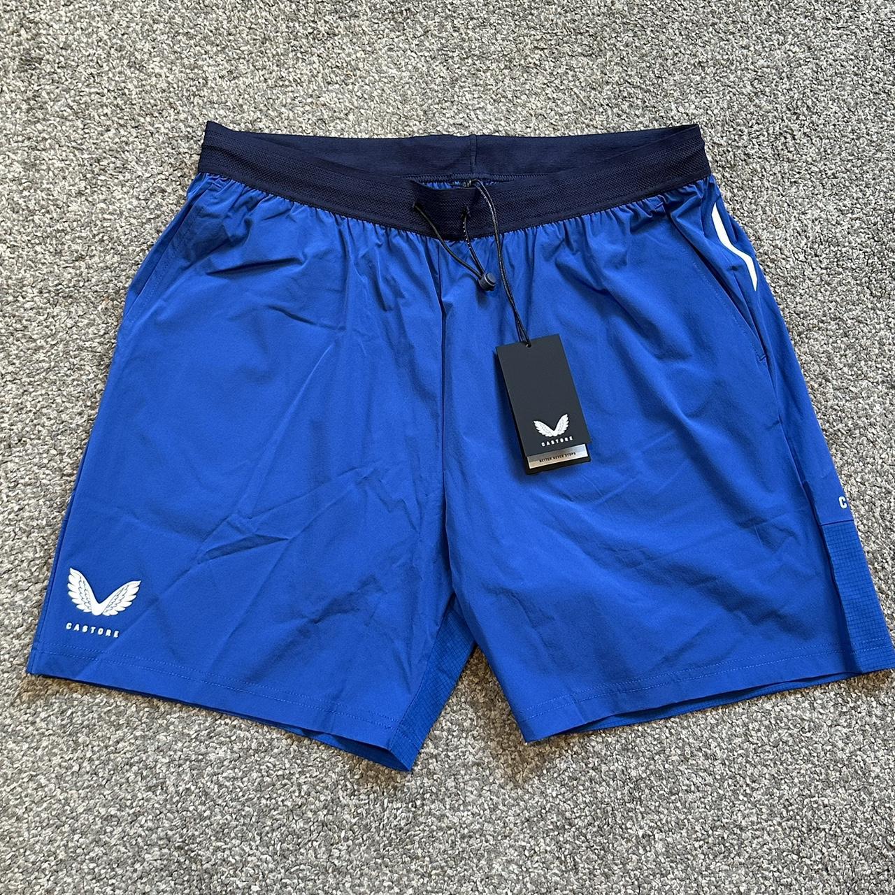 Brand new castore blue shorts with tags Size medium... | Depop