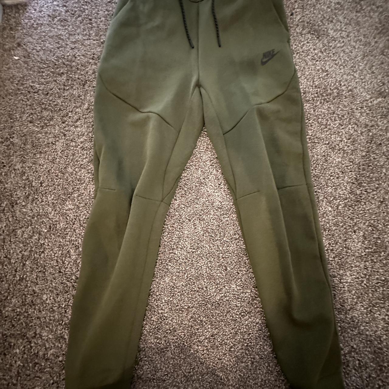 small green nike tech pants - Depop