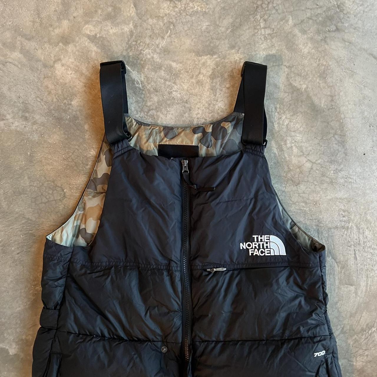 The North Face black puffer overall with Camo inside... - Depop