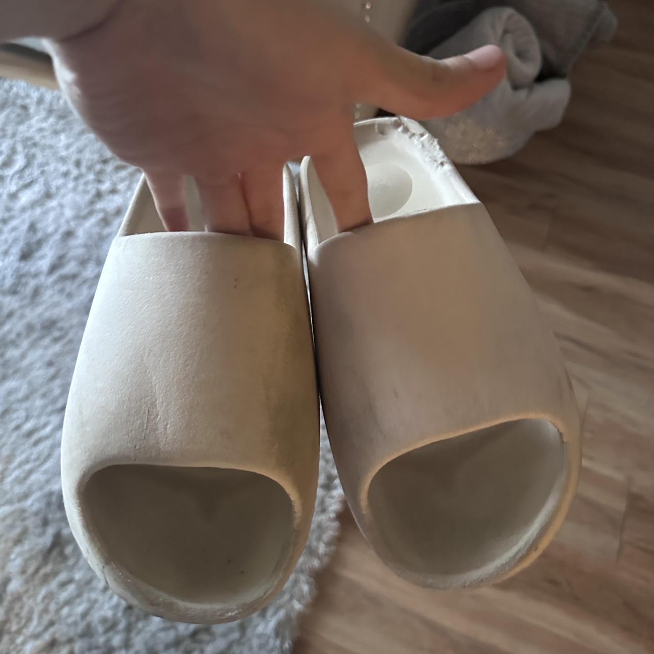 Cream Yeezy slides beat up cause I’ve had them for a... - Depop