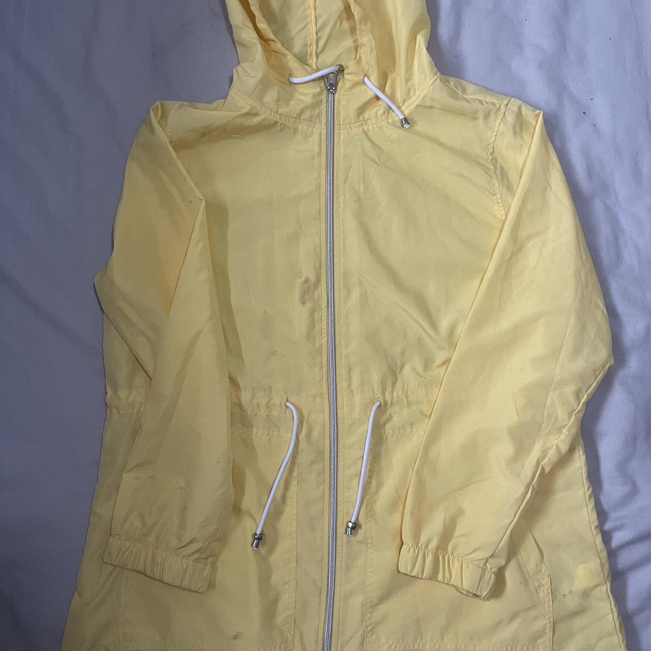 yellow rain coat/ jacket. small stains that can be... - Depop