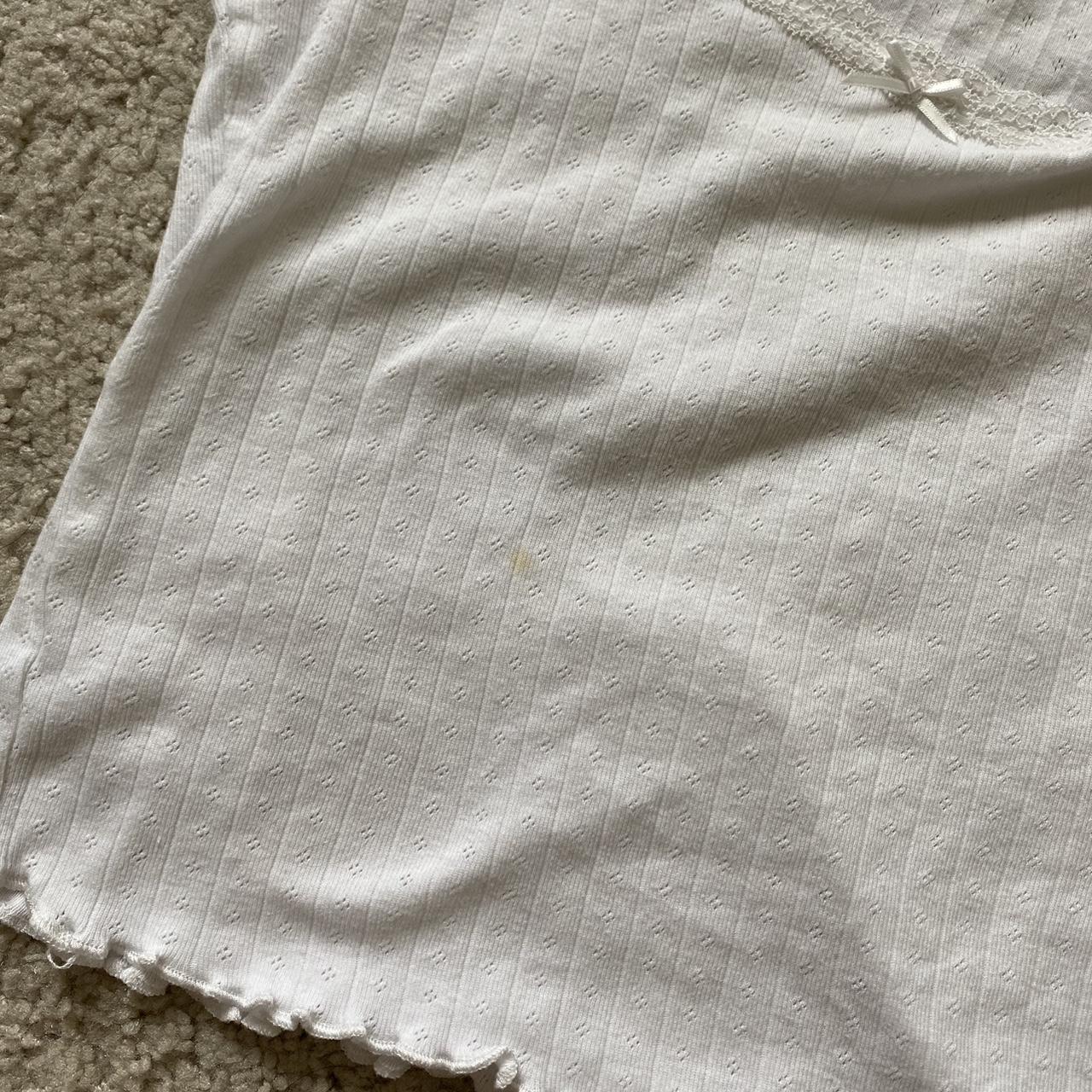 super adorable lace acubi white top with a bow... - Depop