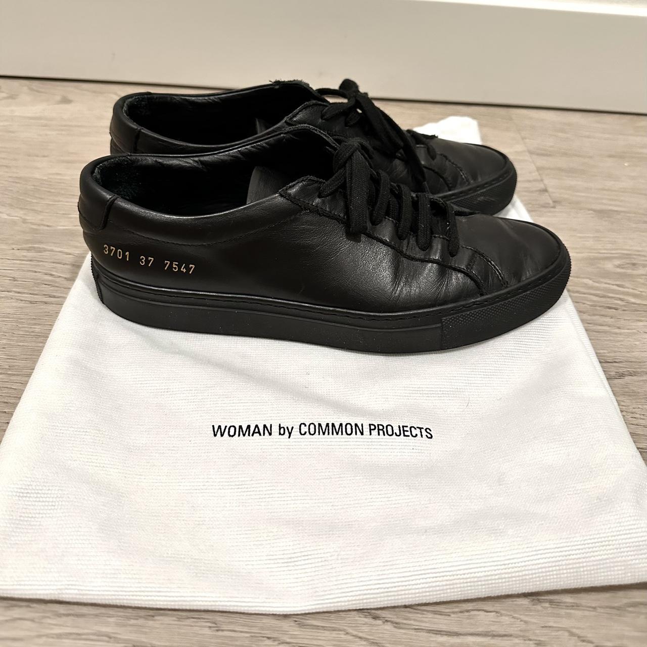 Common Projects Women's Black Trainers | Depop
