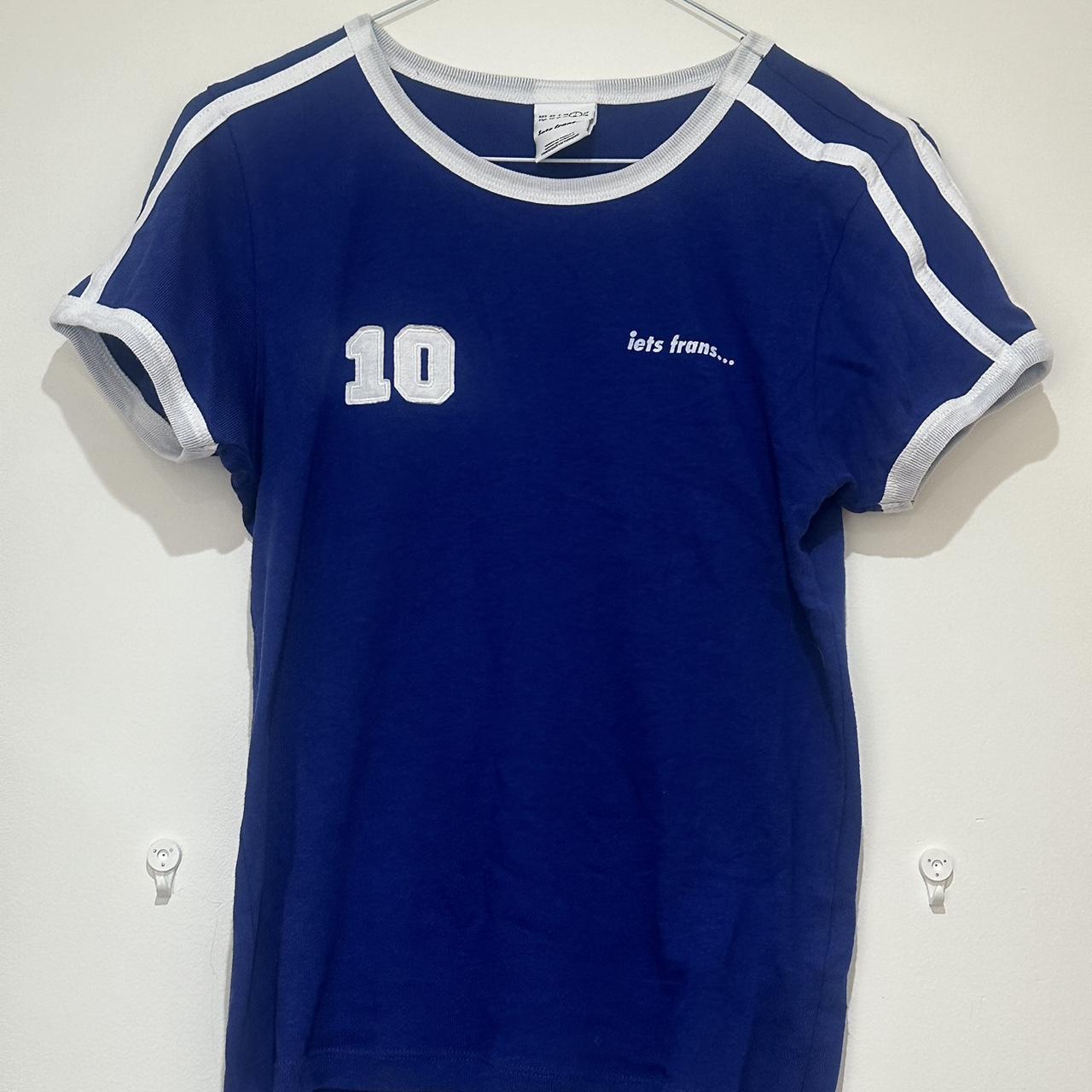 Blue and white football style shirt From Urban... | Depop